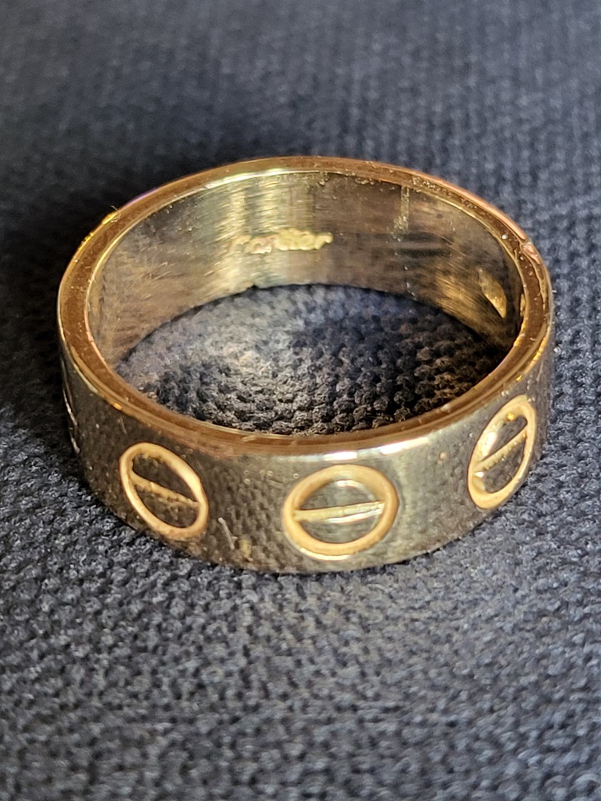 Cartier prsten 18K....6.32g...600€..zamjena