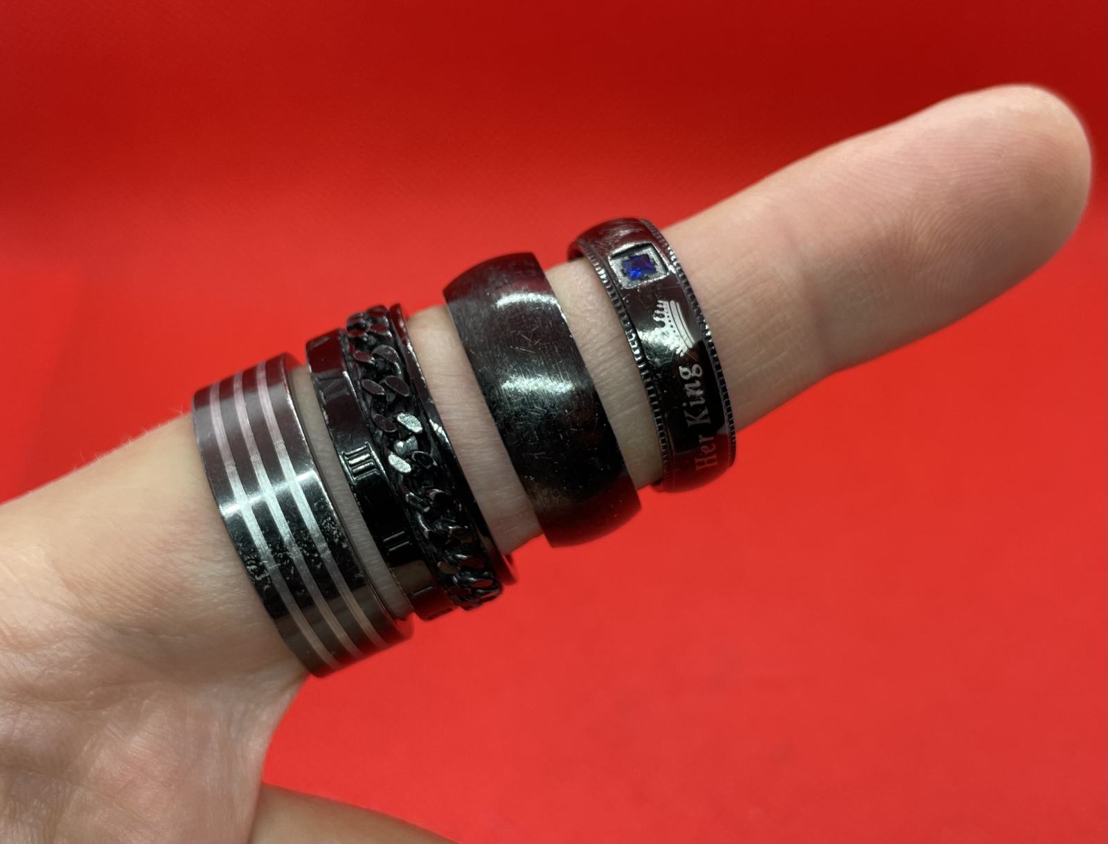 Lot od 4 crna prstena čelik