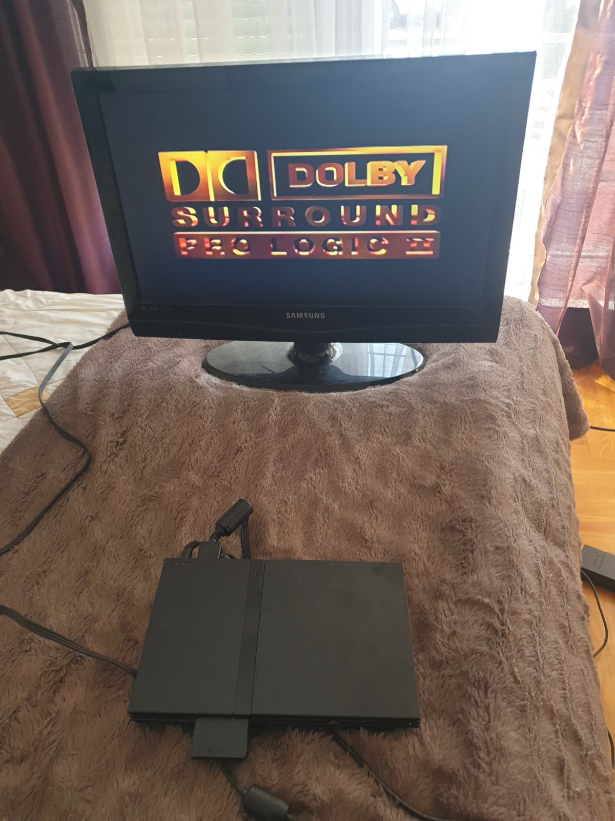 Konzola Playstation 2 + dodaci