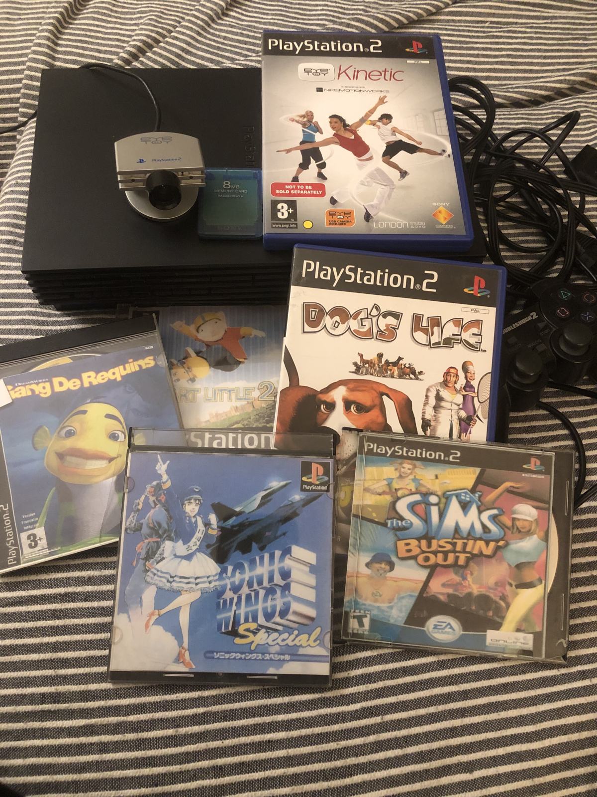 Playstation 2 konzola + kamera + igrice