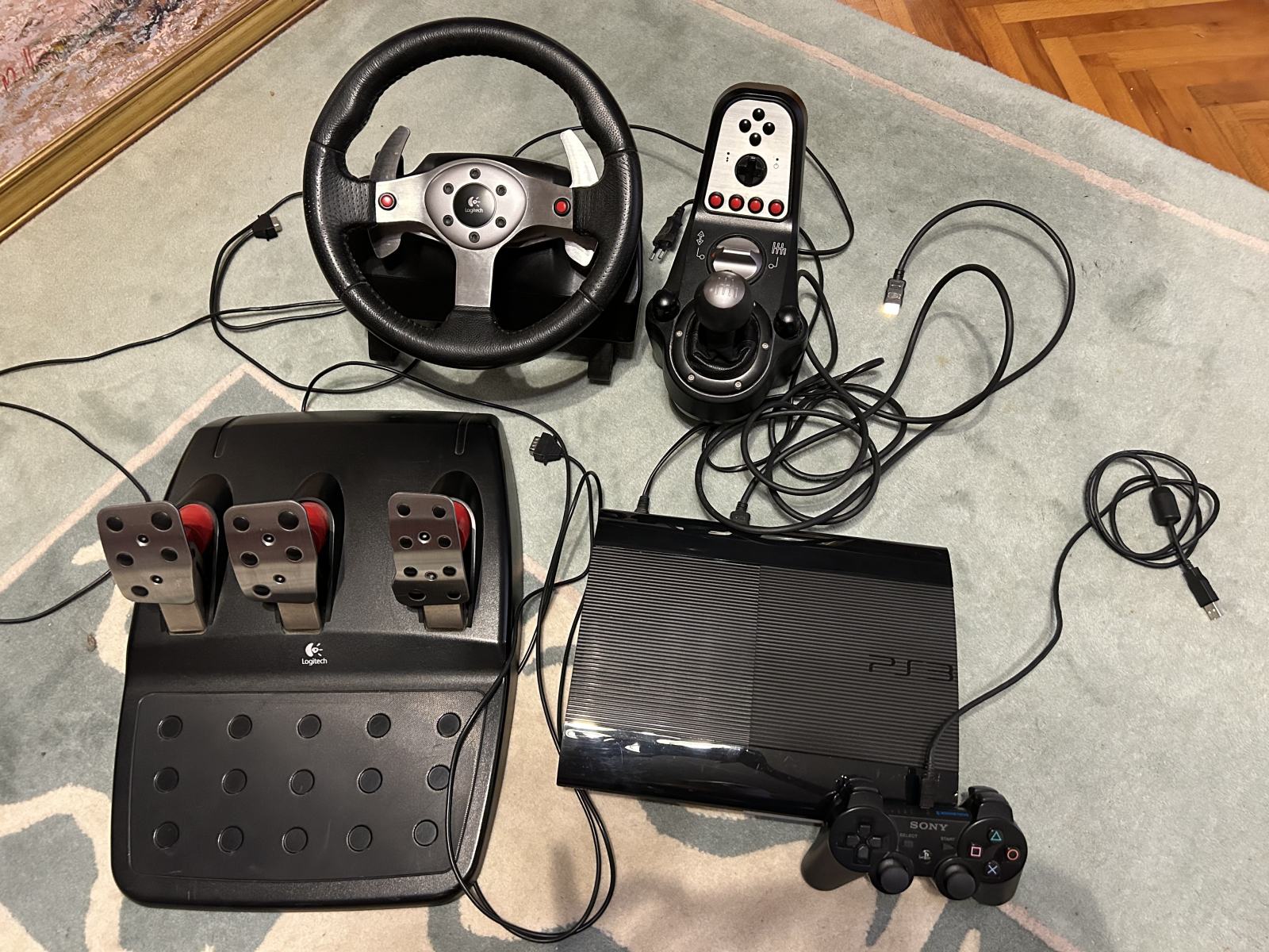 PlayStation 3 500gb konzola + volan Logitech G25 + igre