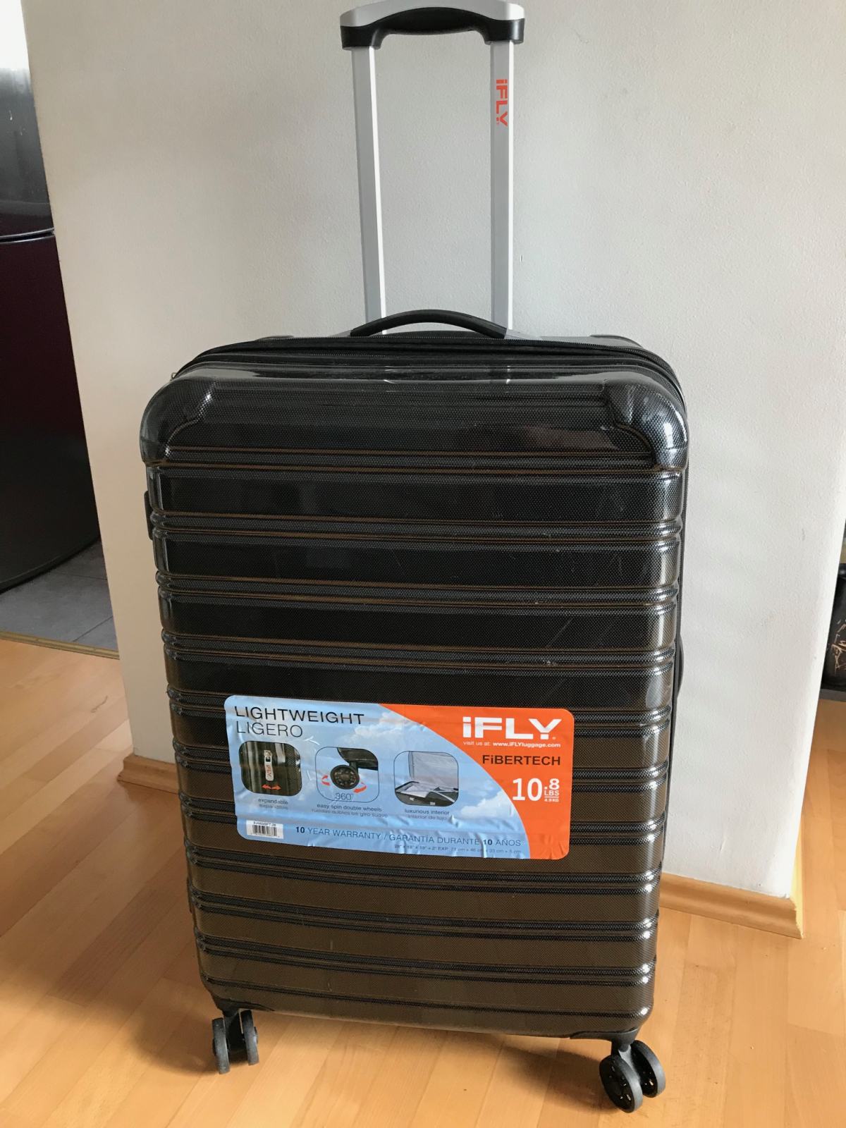 PUTNI KOFER iFLY - novi, tvrdi crni, veliki, 4 kotačića