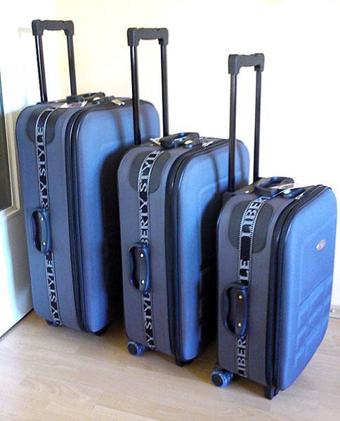 Novi koferi 75 cm, 65 cm i 55 cm, siva boja - komplet od tri kofera