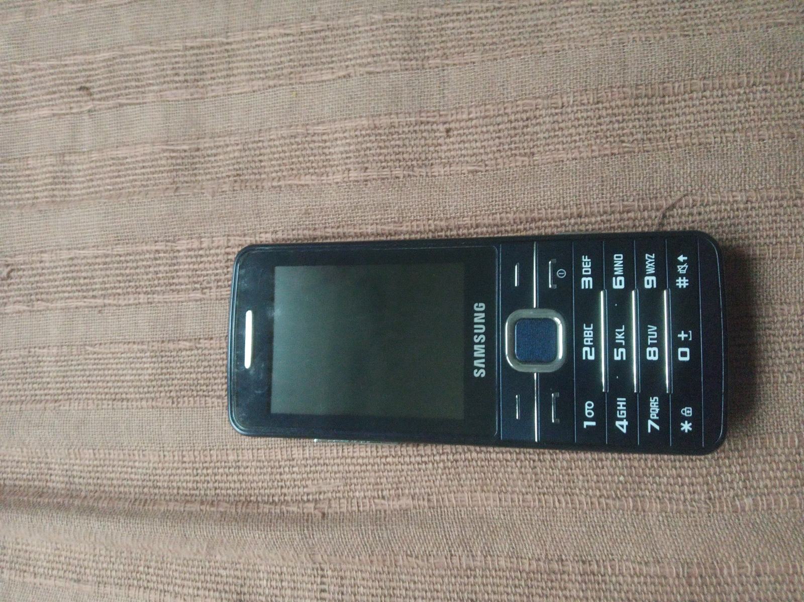 Samsung S5611, sve mreže,odlično stanje,sa punjačem
