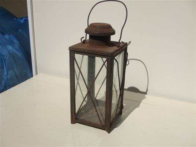 Stari fenjer,drvenu masku, grčku masku i reljefe razne