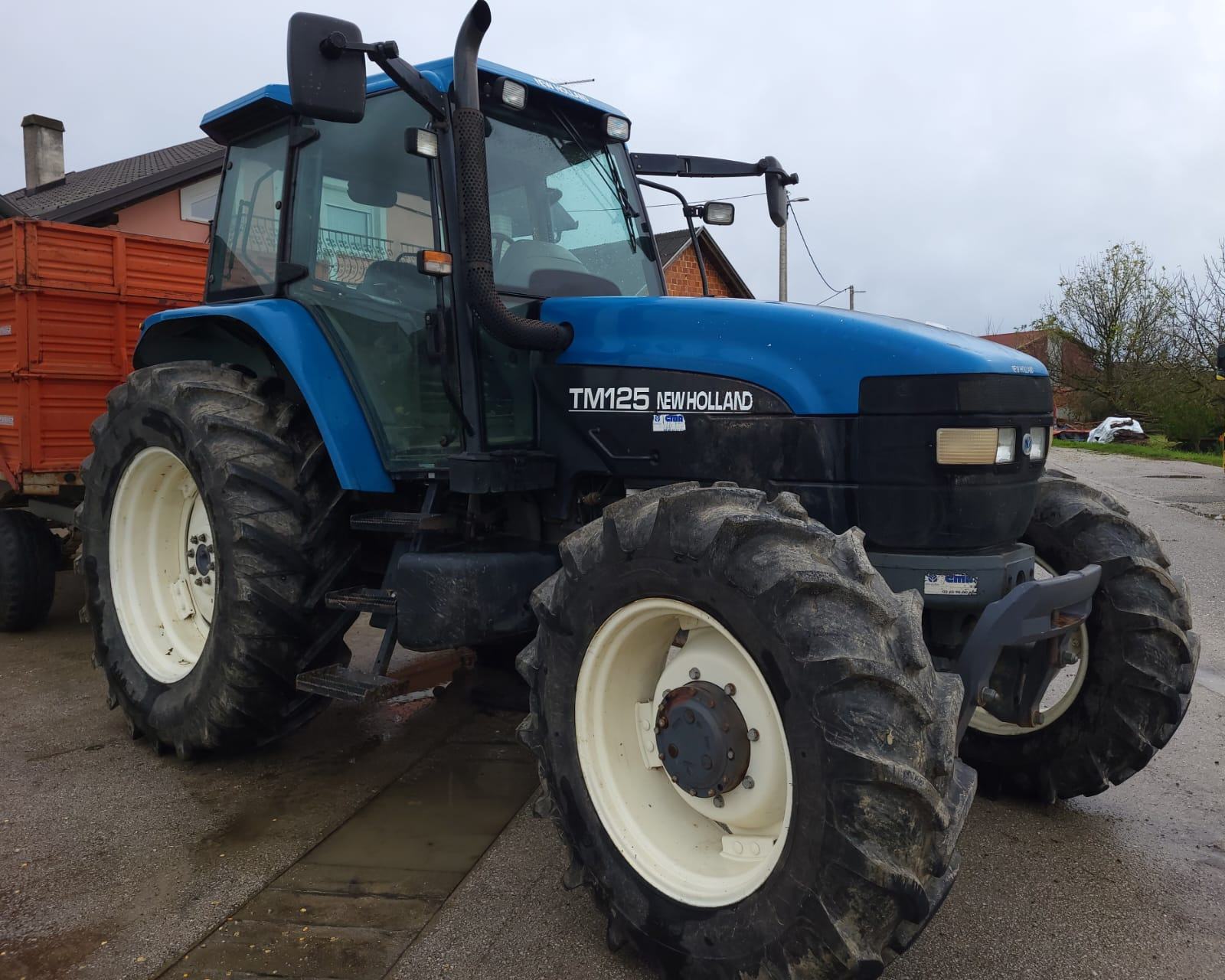 NEW HOLLAND TM125. HITNO!!!