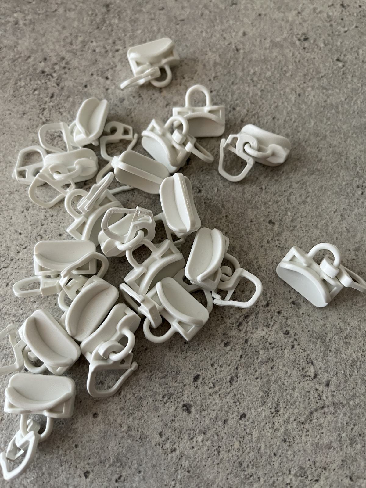 Klizač i kukice za zavjese